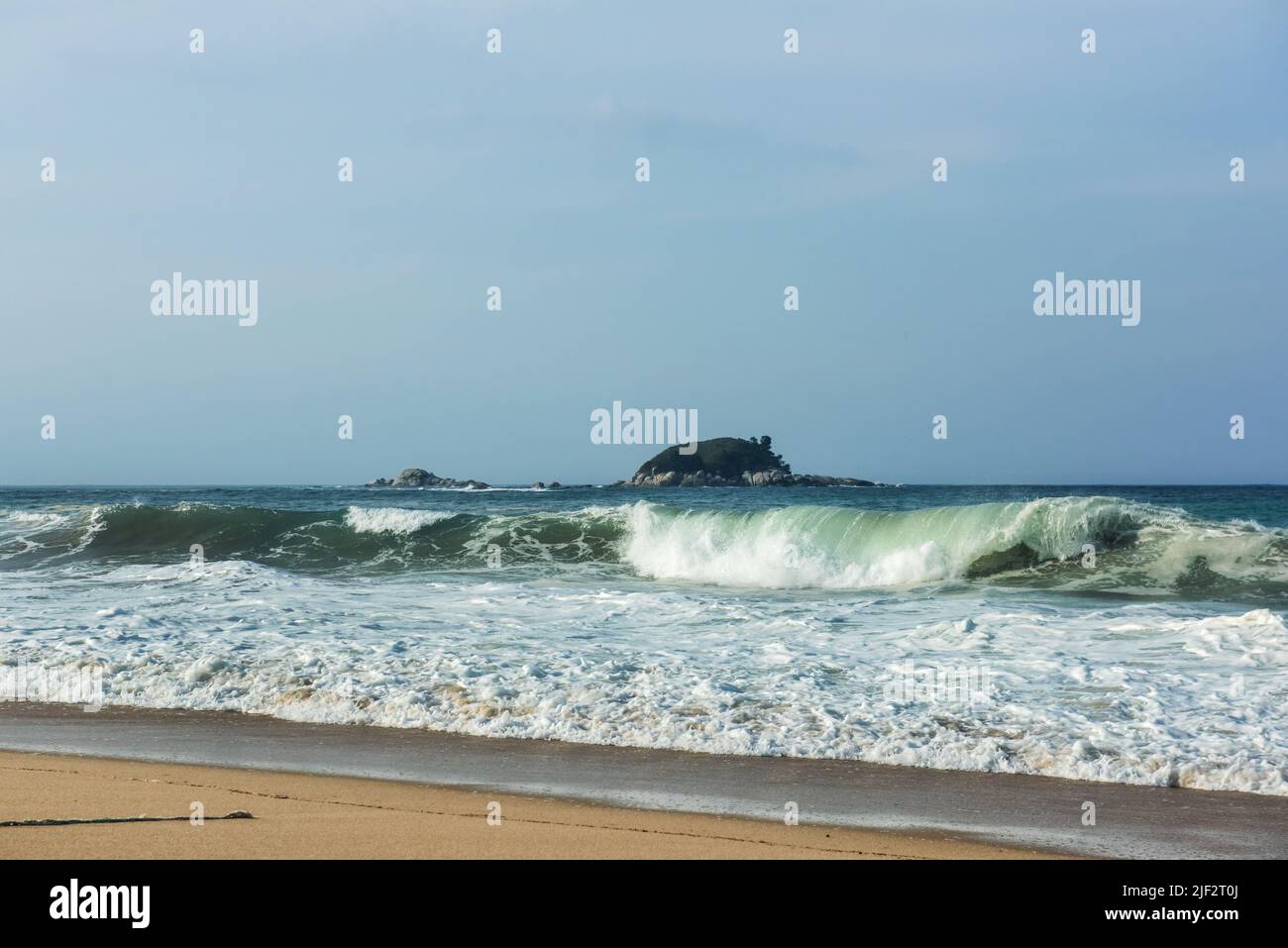 The big breaking waves during a strom at the beautiful summer sea shore ...