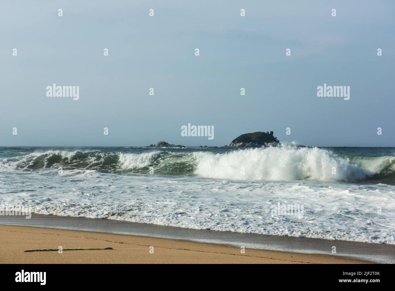 The big breaking waves during a strom at the beautiful summer sea shore ...