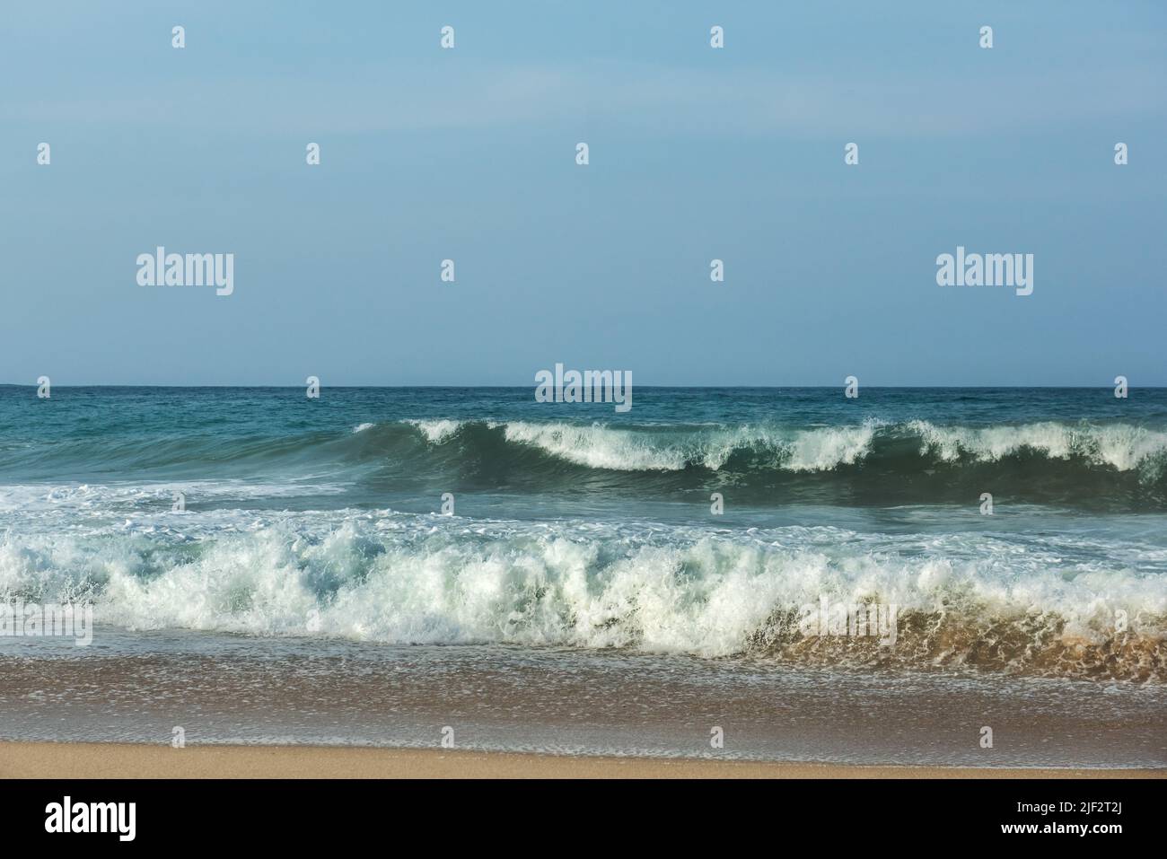 The big breaking waves during a strom at the beautiful summer sea shore ...