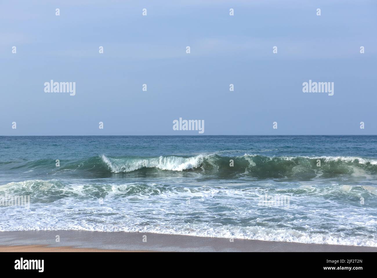 The big breaking waves during a strom at the beautiful summer sea shore ...