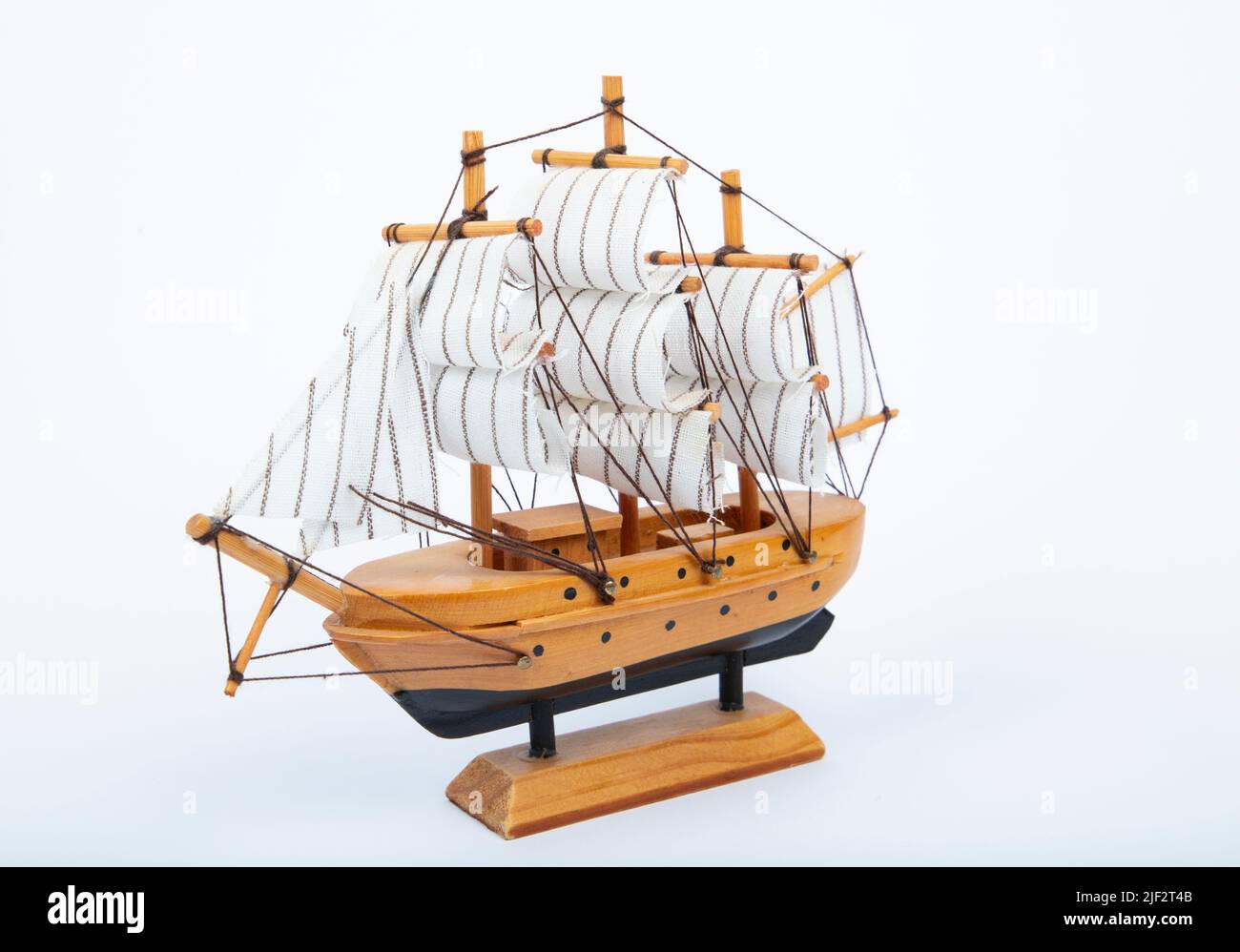 Beautiful small ship model isolated on white Stock Photo - Alamy