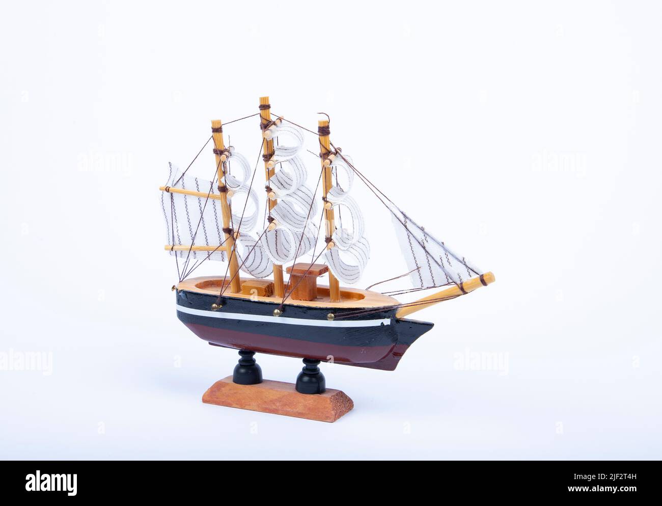 Beautiful small ship model isolated on white Stock Photo - Alamy