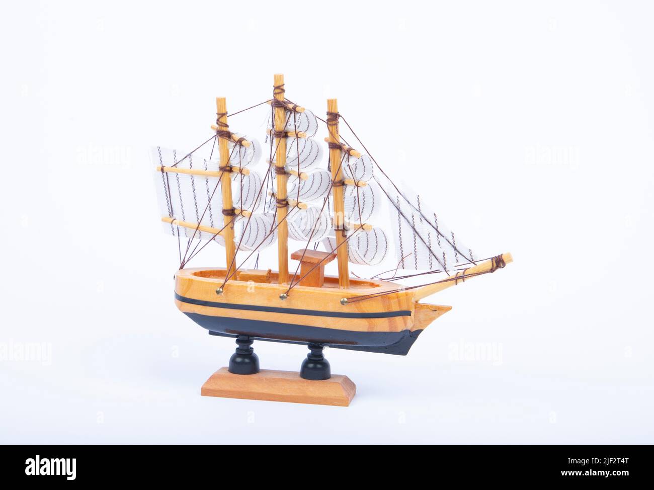 Beautiful small ship model isolated on white Stock Photo - Alamy