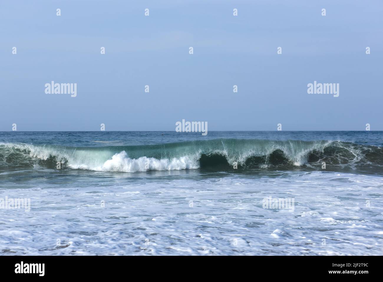 The big breaking waves during a strom at the beautiful summer sea shore ...