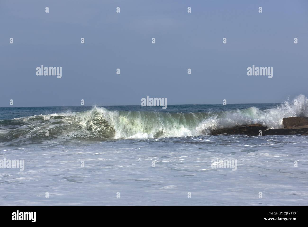 The big breaking waves during a strom at the beautiful summer sea shore ...