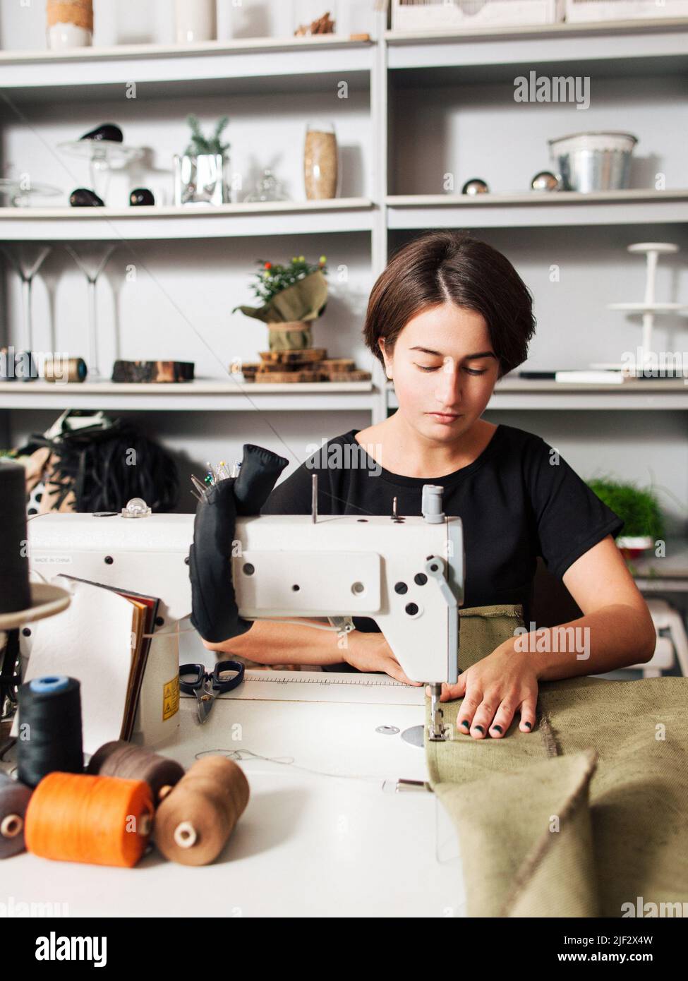 Seamstress hi-res stock photography and images - Alamy