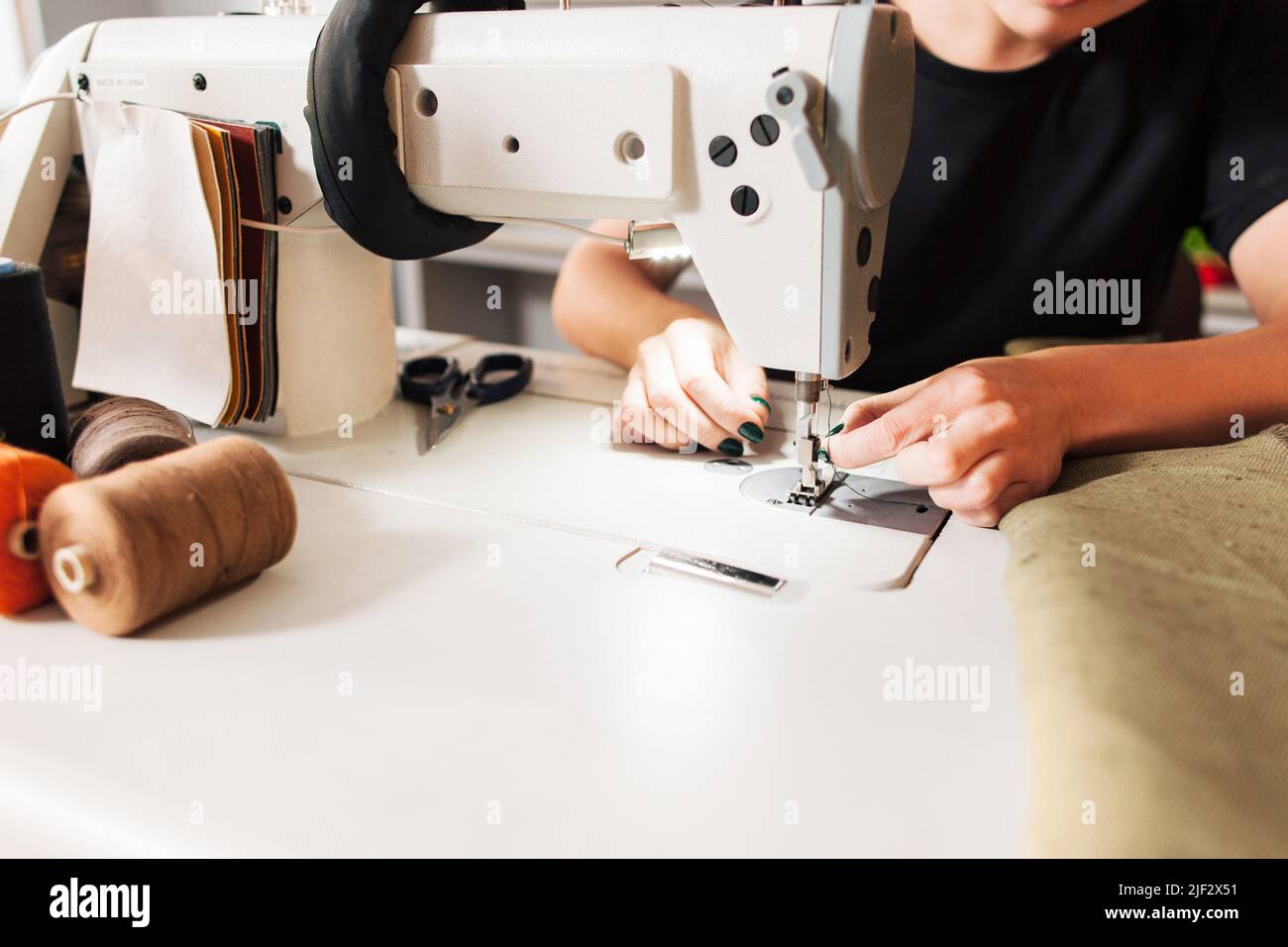 Thread in needle sewing hi-res stock photography and images - Alamy