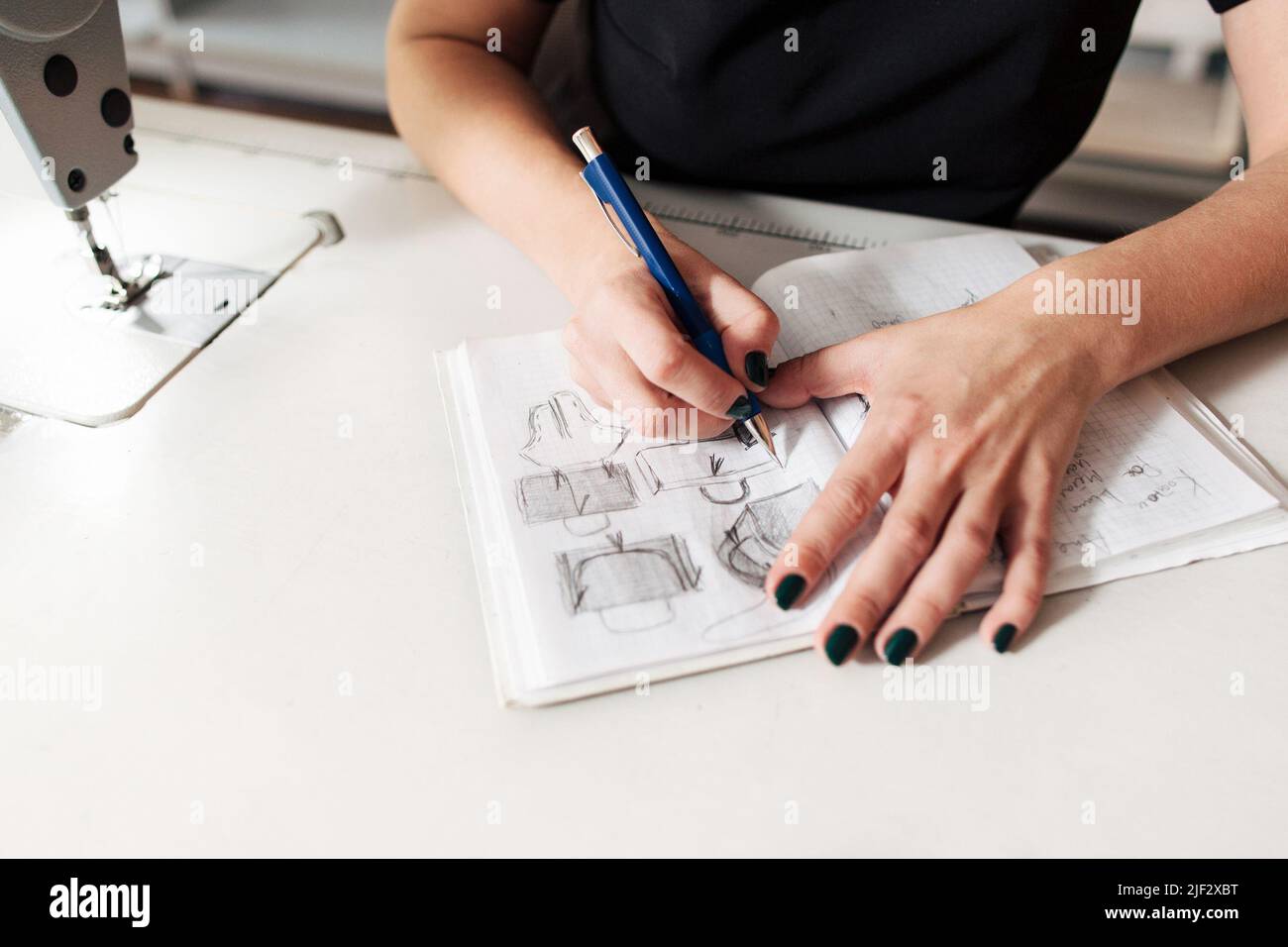Female seamstress drawing sewing hi-res stock photography and images ...