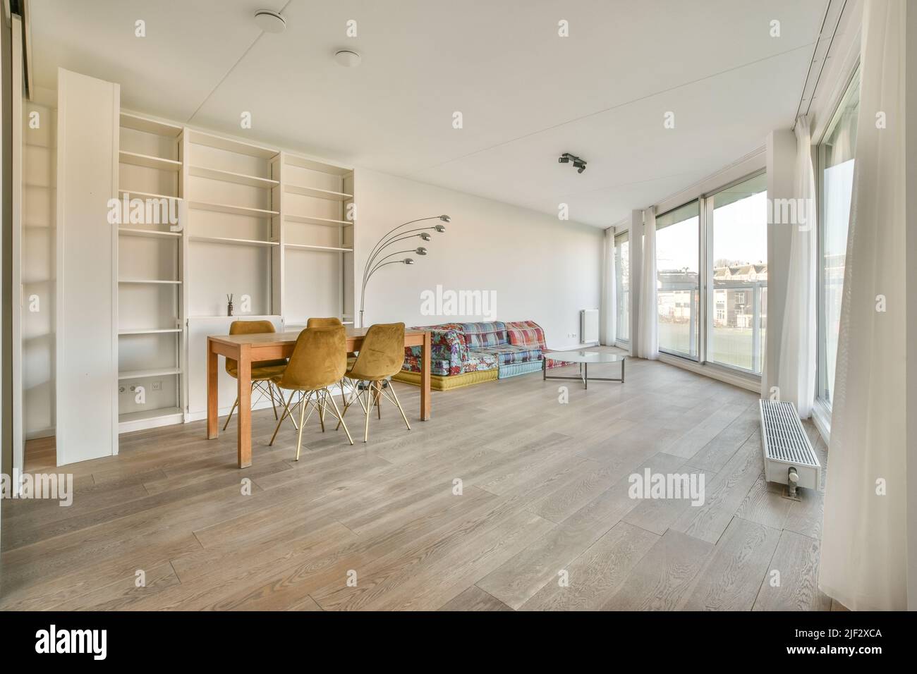 Interior of stylish living room with comfortable sofa and armchairs ...