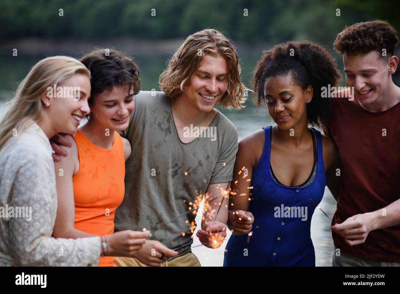 Group of friends celebrating sunset hi-res stock photography and images ...