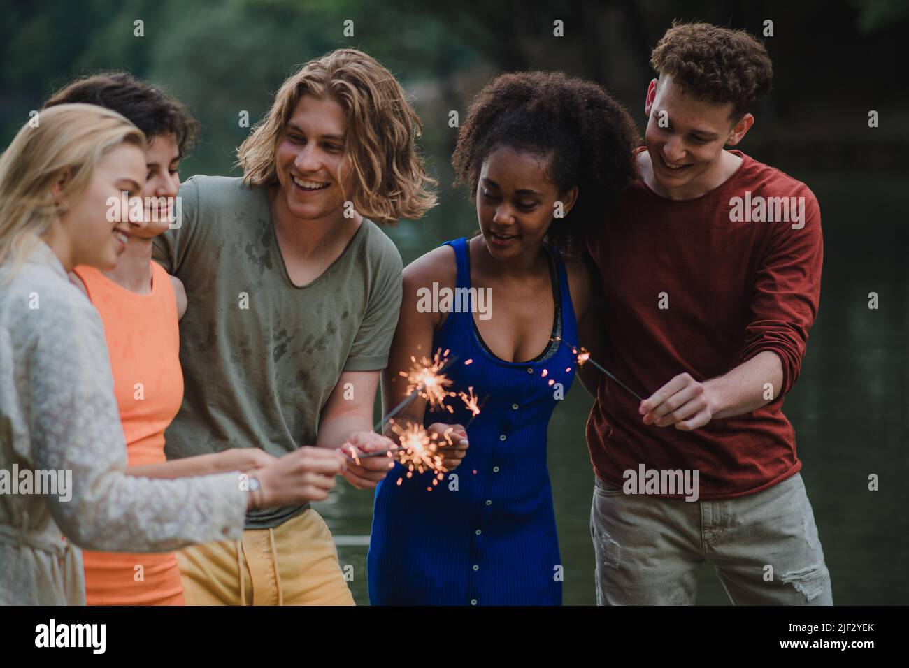 Group of friends celebrating sunset hi-res stock photography and images ...