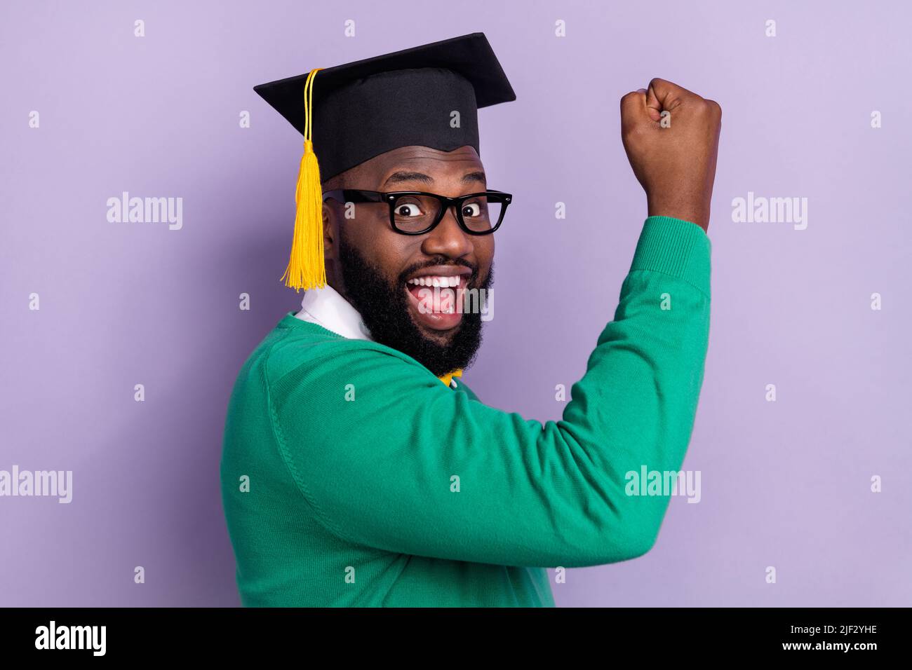 Profile photo of delighted successful person raise fist achieve ...