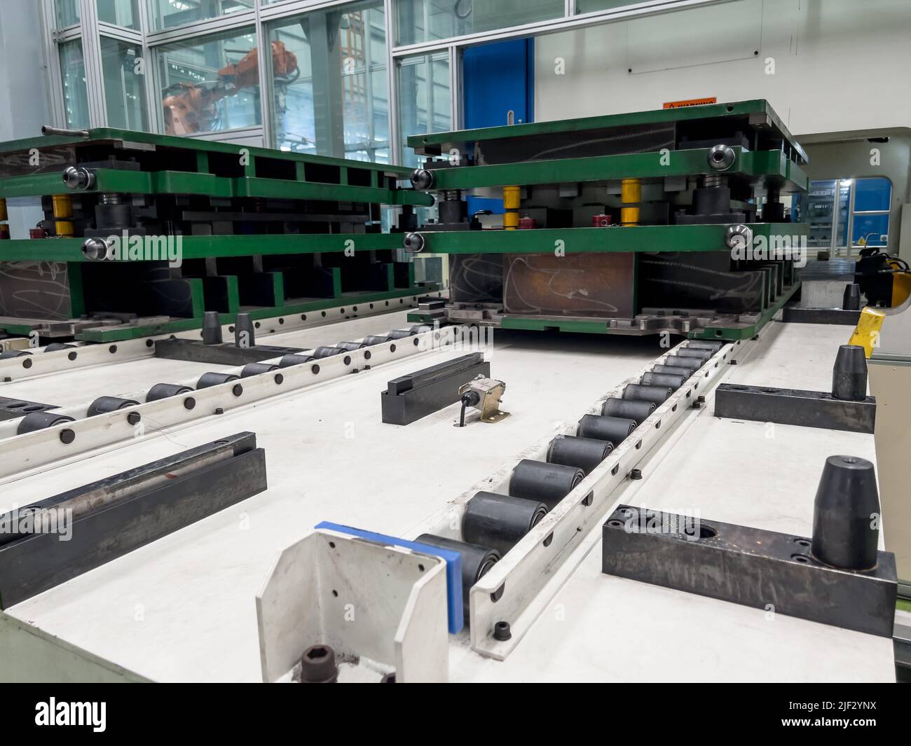 roller conveyor for move mold to press machine (Soft focus Stock Photo ...