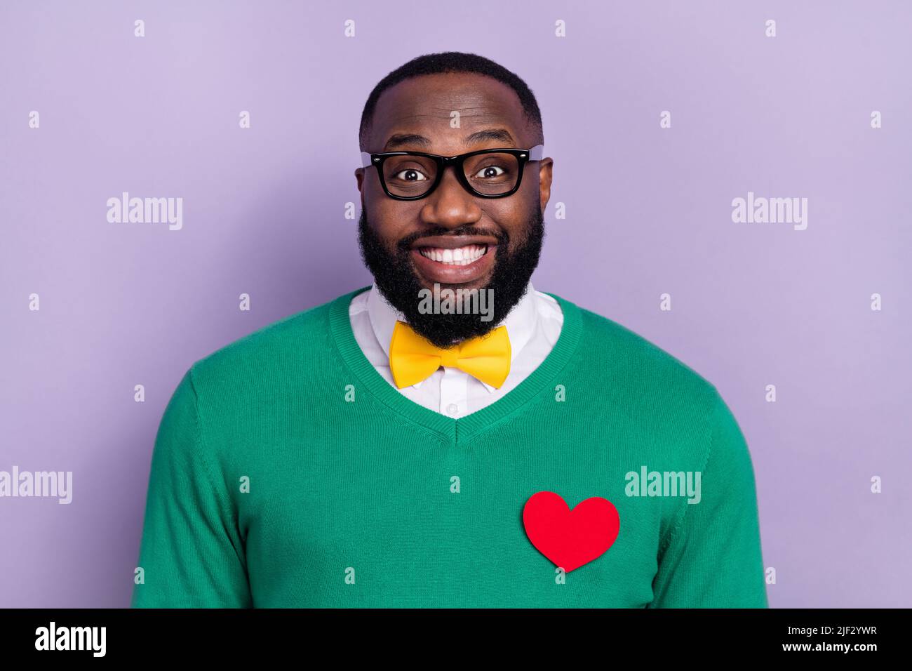 Photo of cheerful friendly person toothy smile small red heart chest ...