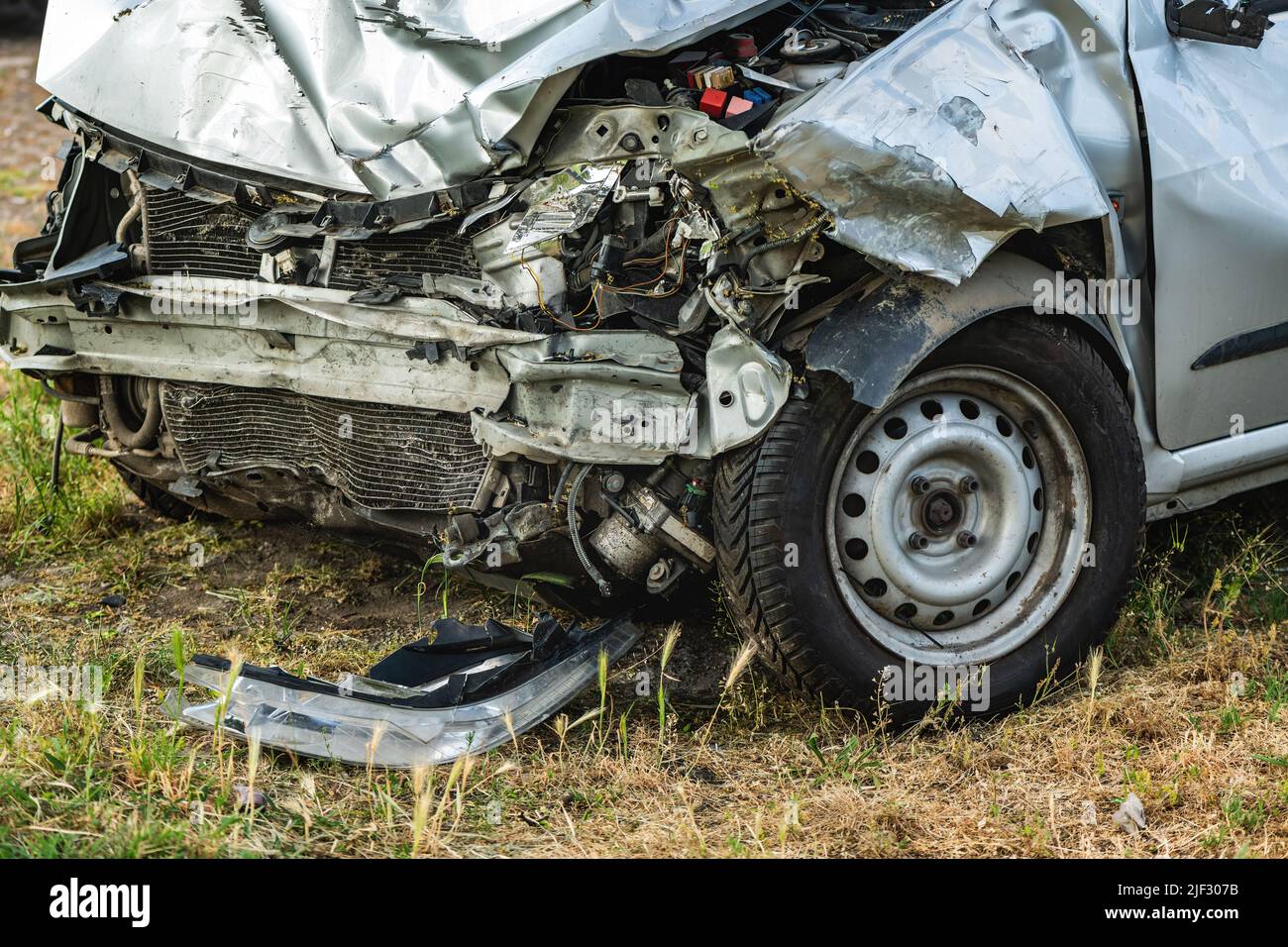 Crushed and damaged car after traffic accident, selective focus Stock ...