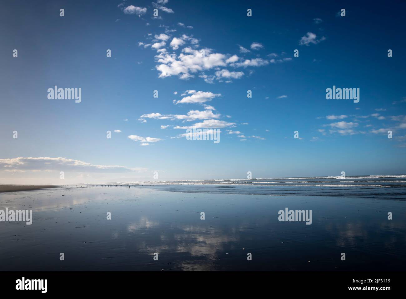 Clouds reflected in wet beach, Kaiapoi, Canterbury, South Island, New ...