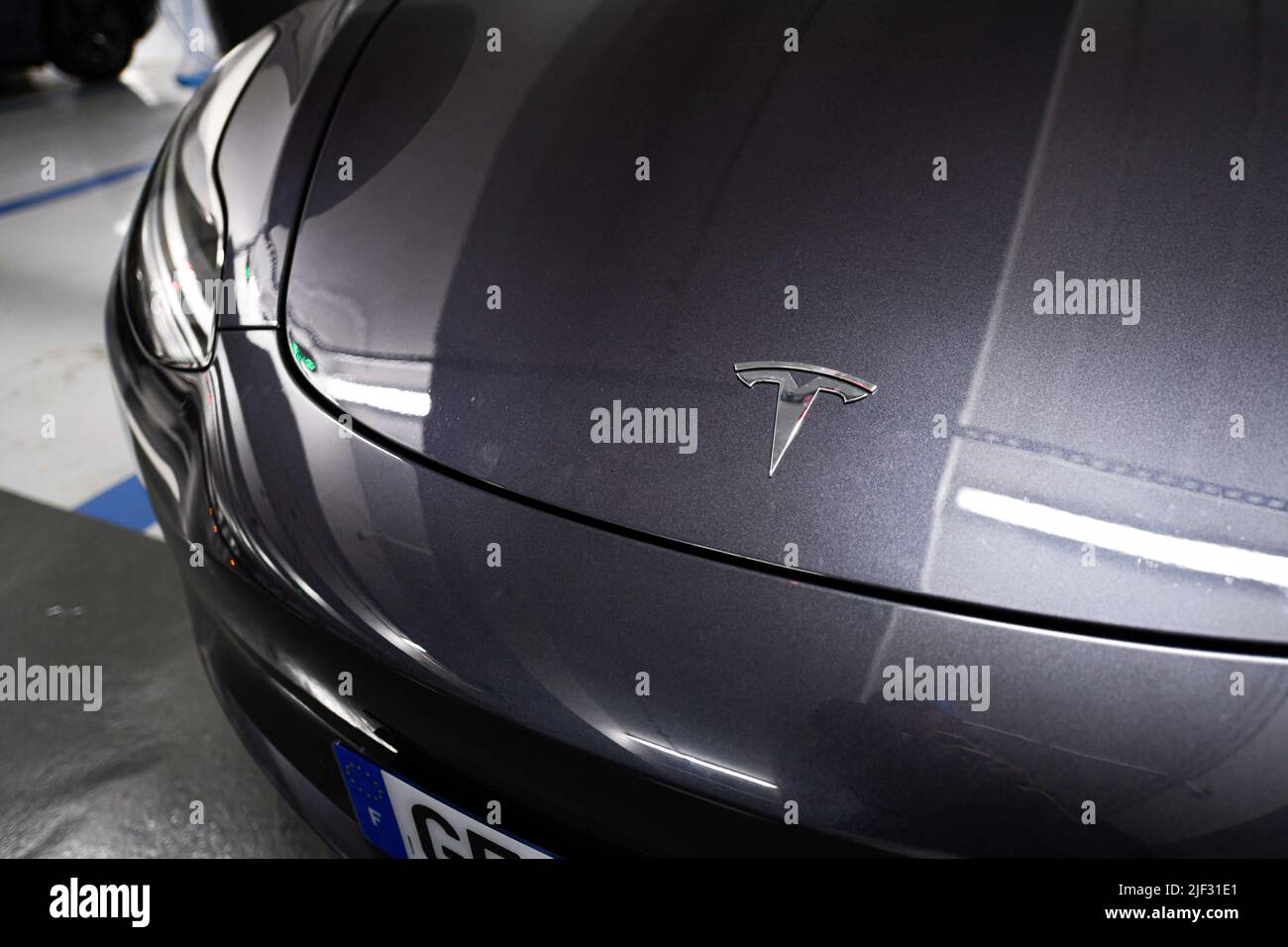 Parking under the Madeleine church, with Tesla cars (with the logo here ...