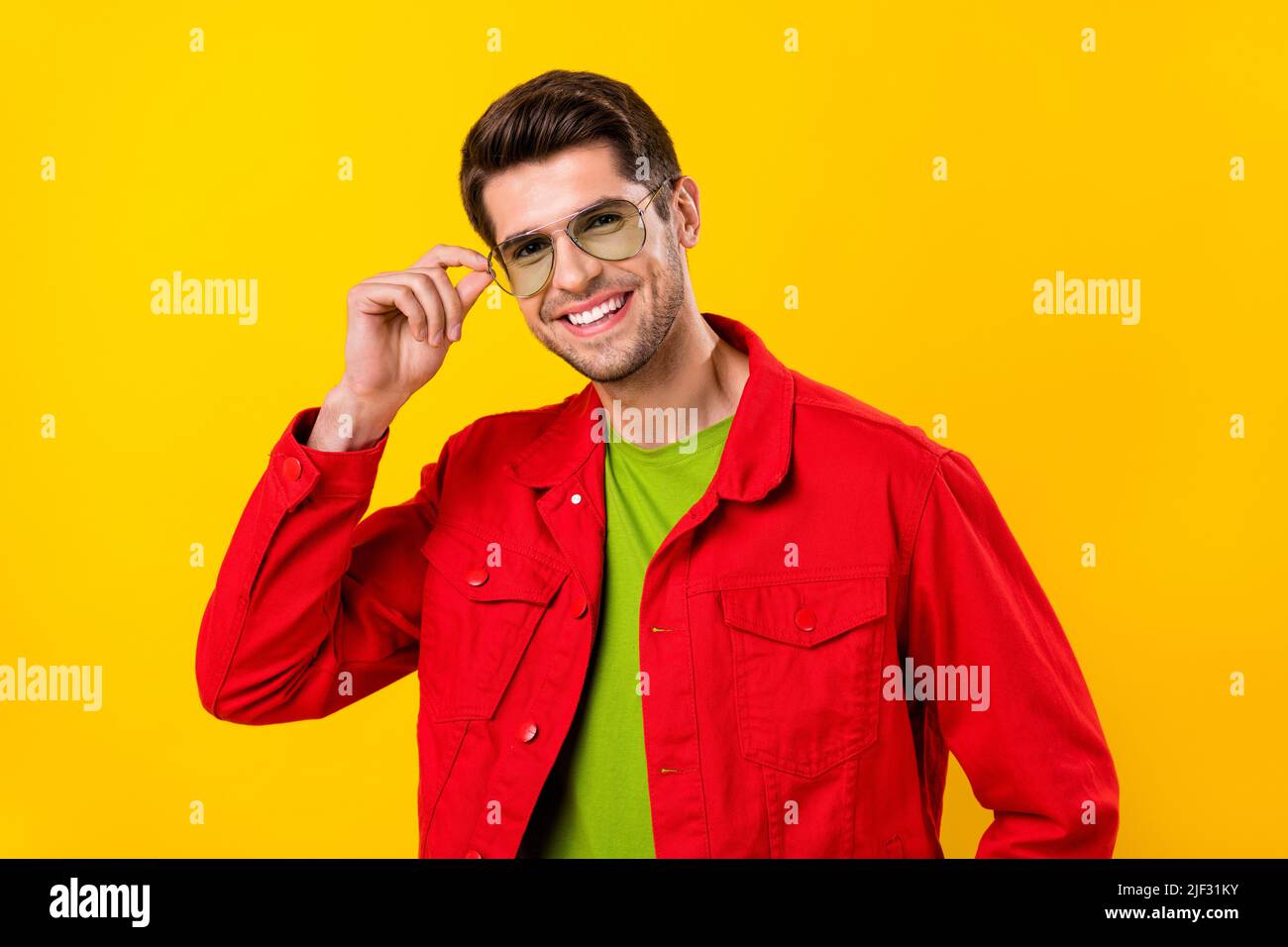 Photo of funny millennial brunet guy wear red shirt glasses isolated on ...
