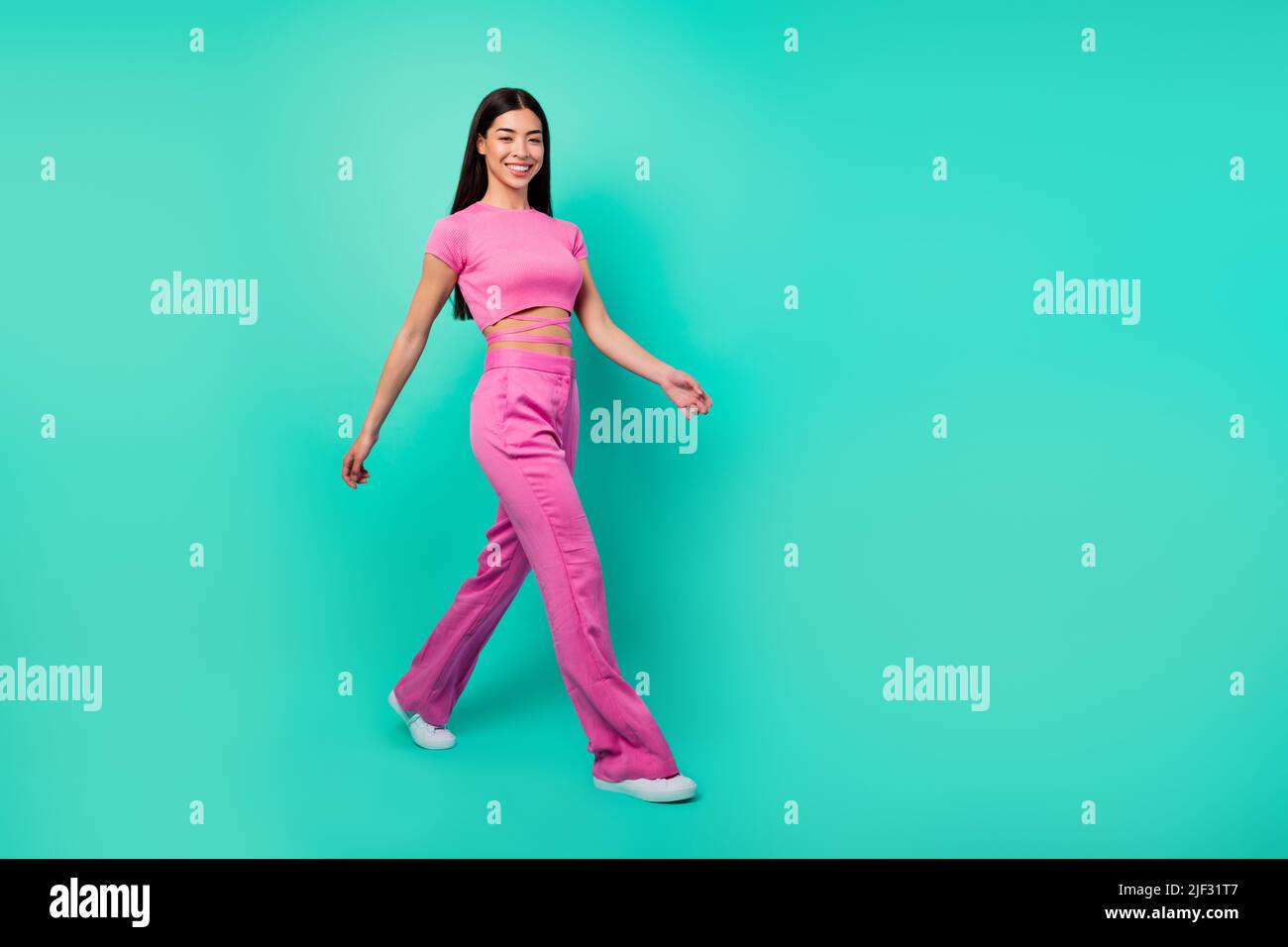 Full body profile side image of cheerful energetic lady in pink outfit ...