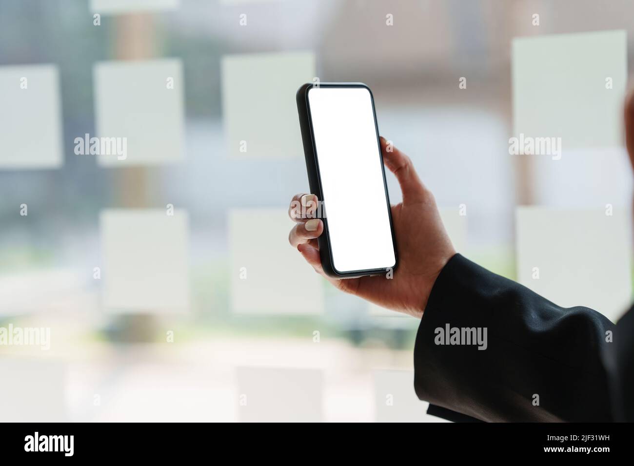 A Woman excited surprise and showing cell phone screen. Blank screen ...