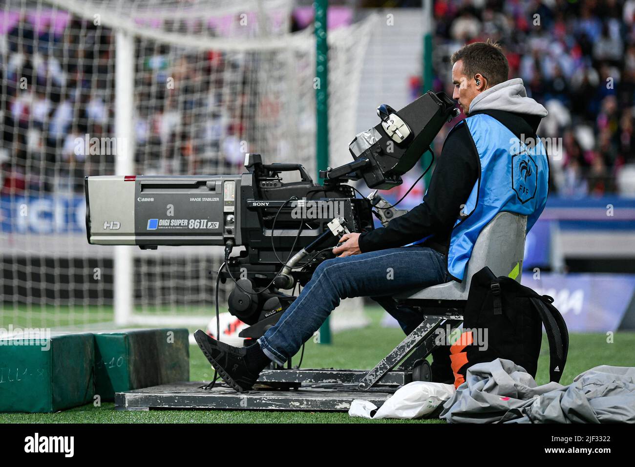 Illustration picture shows a man (cameraman, camera operator) filming ...