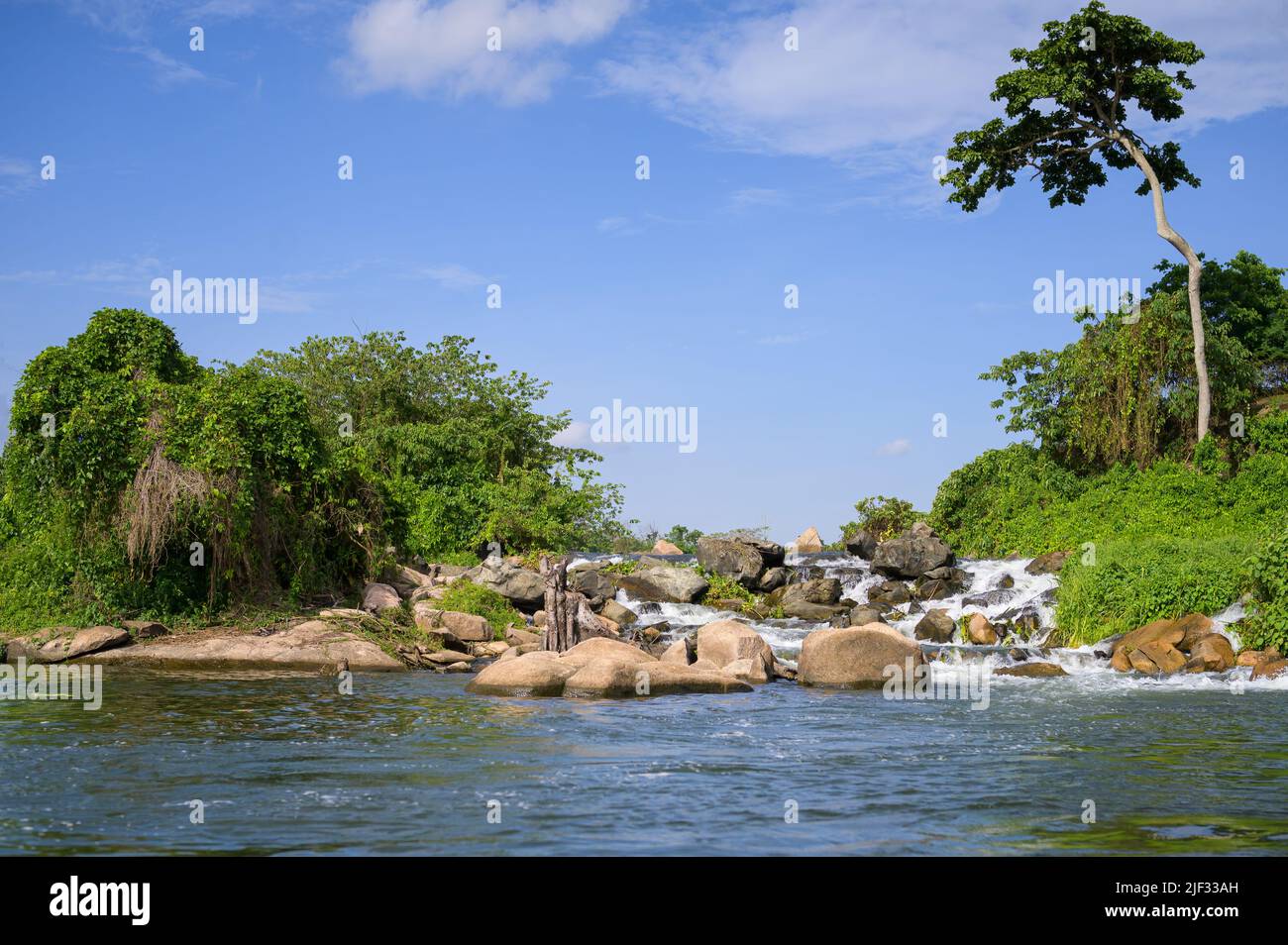 The Itanda Falls of the Victoria Nile in Uganda, sunny day in May Stock ...