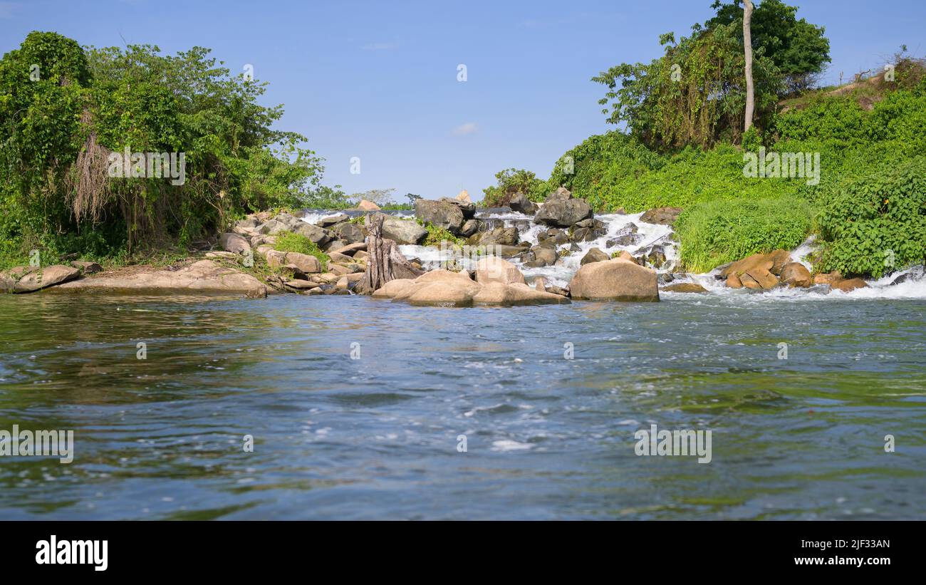 The Itanda Falls of the Victoria Nile in Uganda, sunny day in May Stock ...