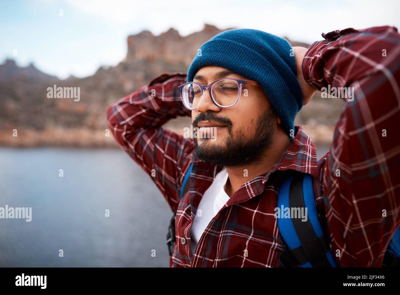 Man meditates closed eyes hi-res stock photography and images - Alamy