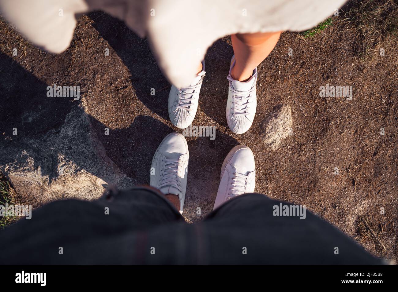 Feet of an heterosexual couple looking at each other from above Stock ...