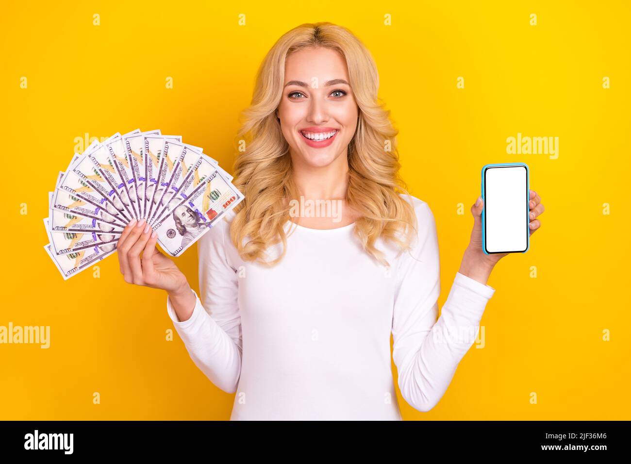 Photo of cute pretty lady dressed white shirt holding cash fan device ...