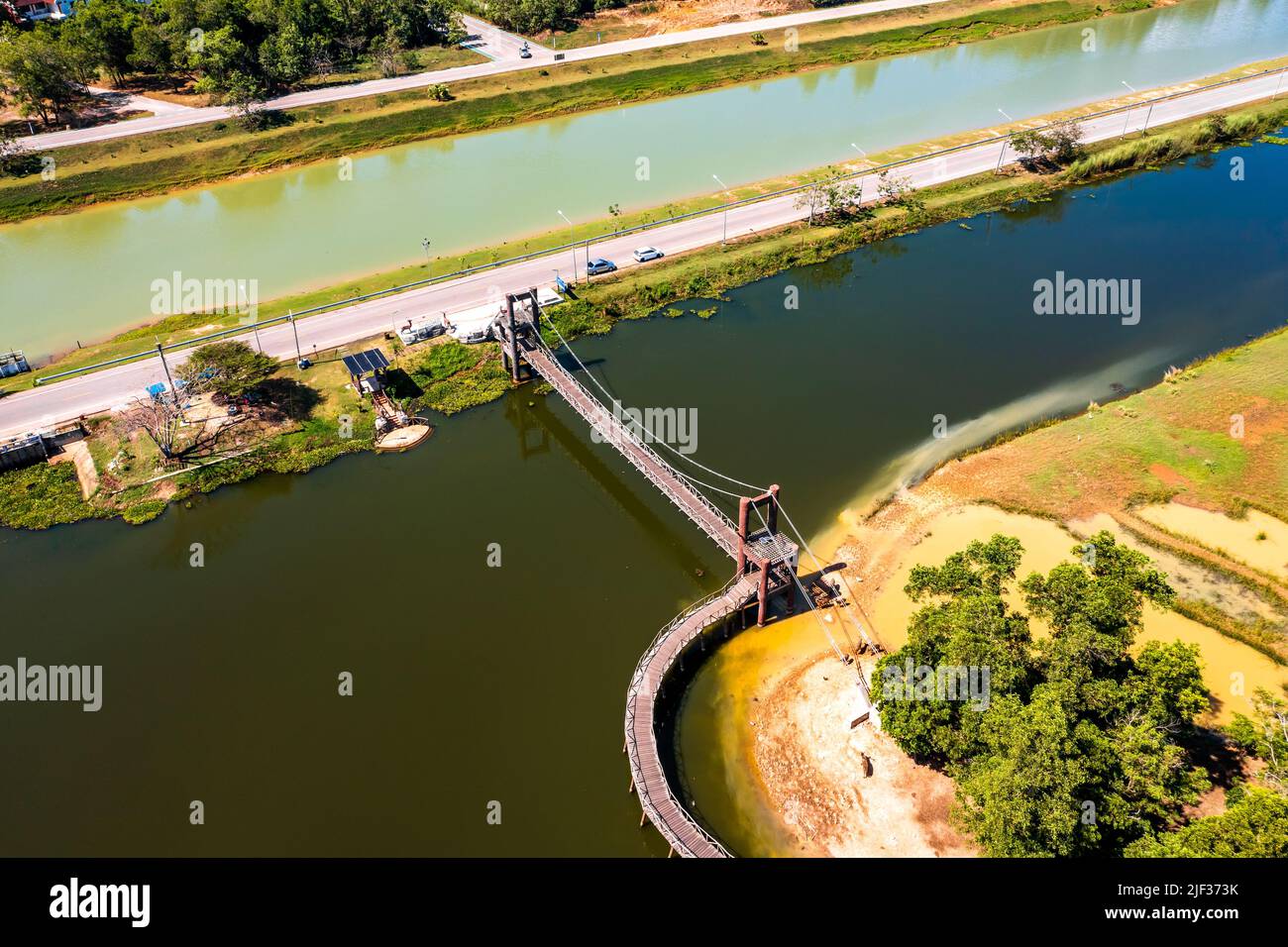 Nong Yai Pond and Wooden Bridge in Chumphon, Thailand Stock Photo - Alamy