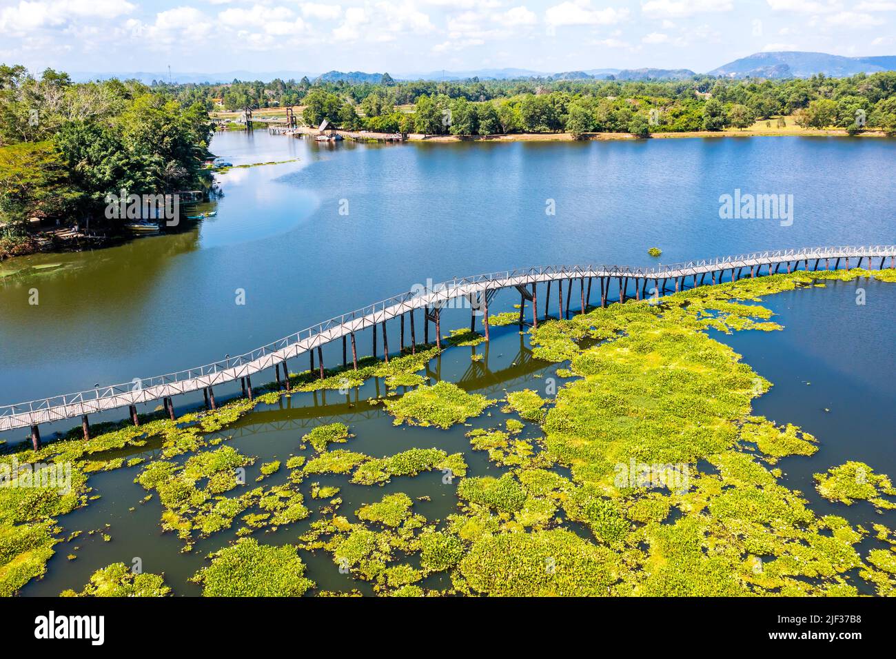 Nong Yai Pond and Wooden Bridge in Chumphon, Thailand Stock Photo - Alamy