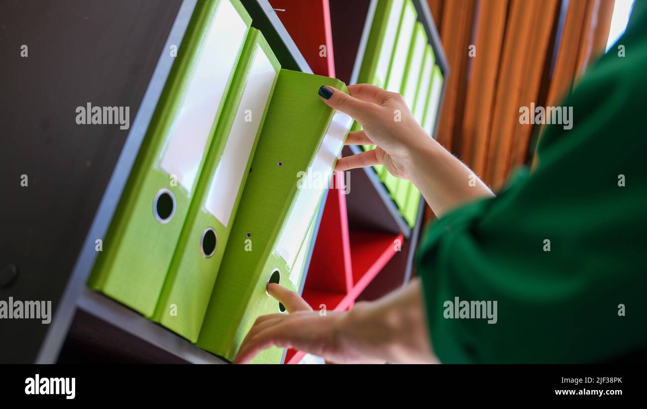 Hand takes stack documents binder hi-res stock photography and images ...