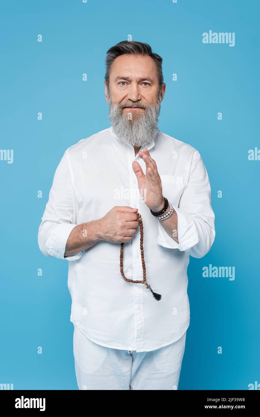 grey haired master guru with rosary showing blessing gesture isolated ...