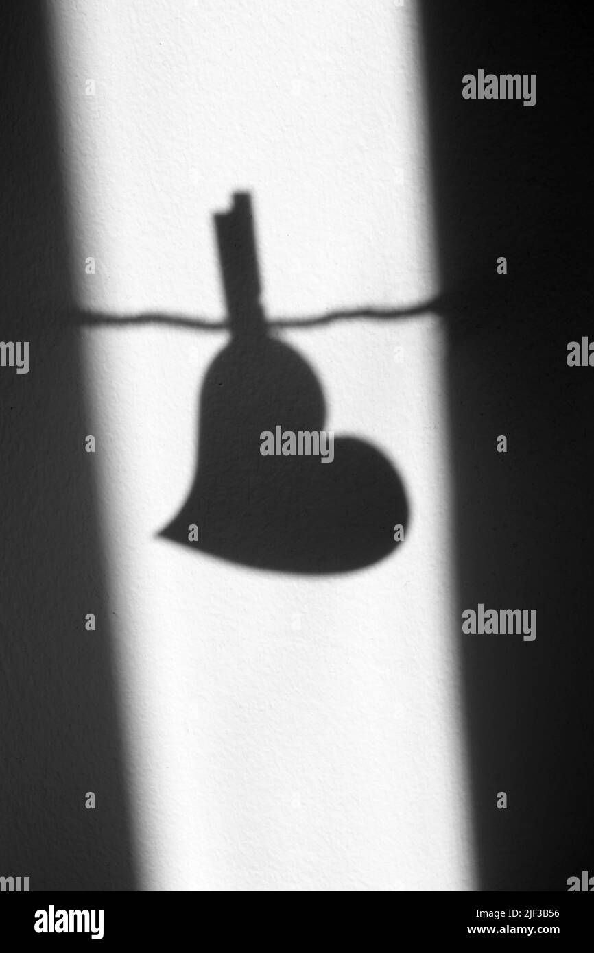 Light heart symbol on Black and White Stock Photos & Images - Alamy