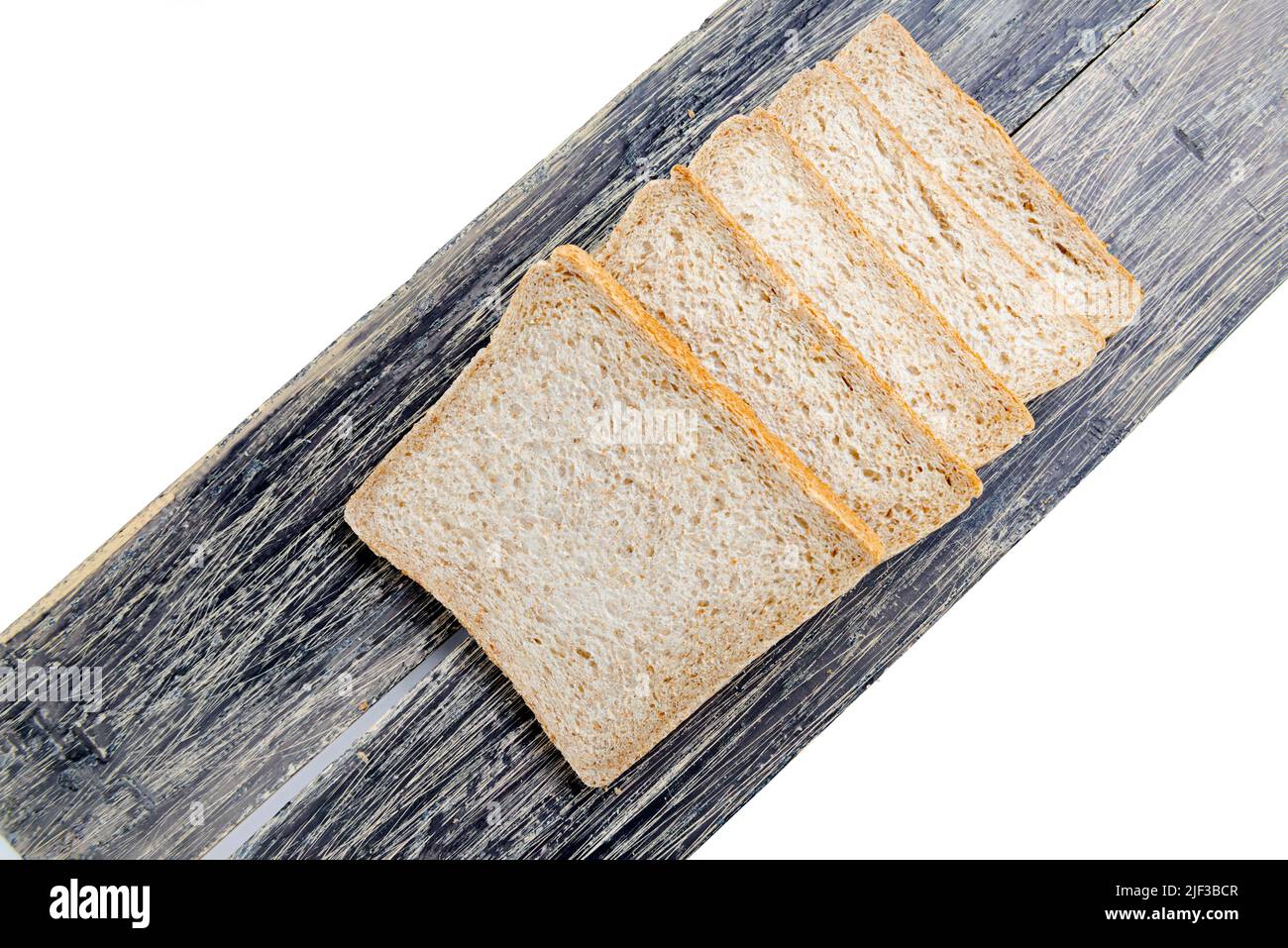 Sliced bread on the board isolated over white background Stock Photo ...