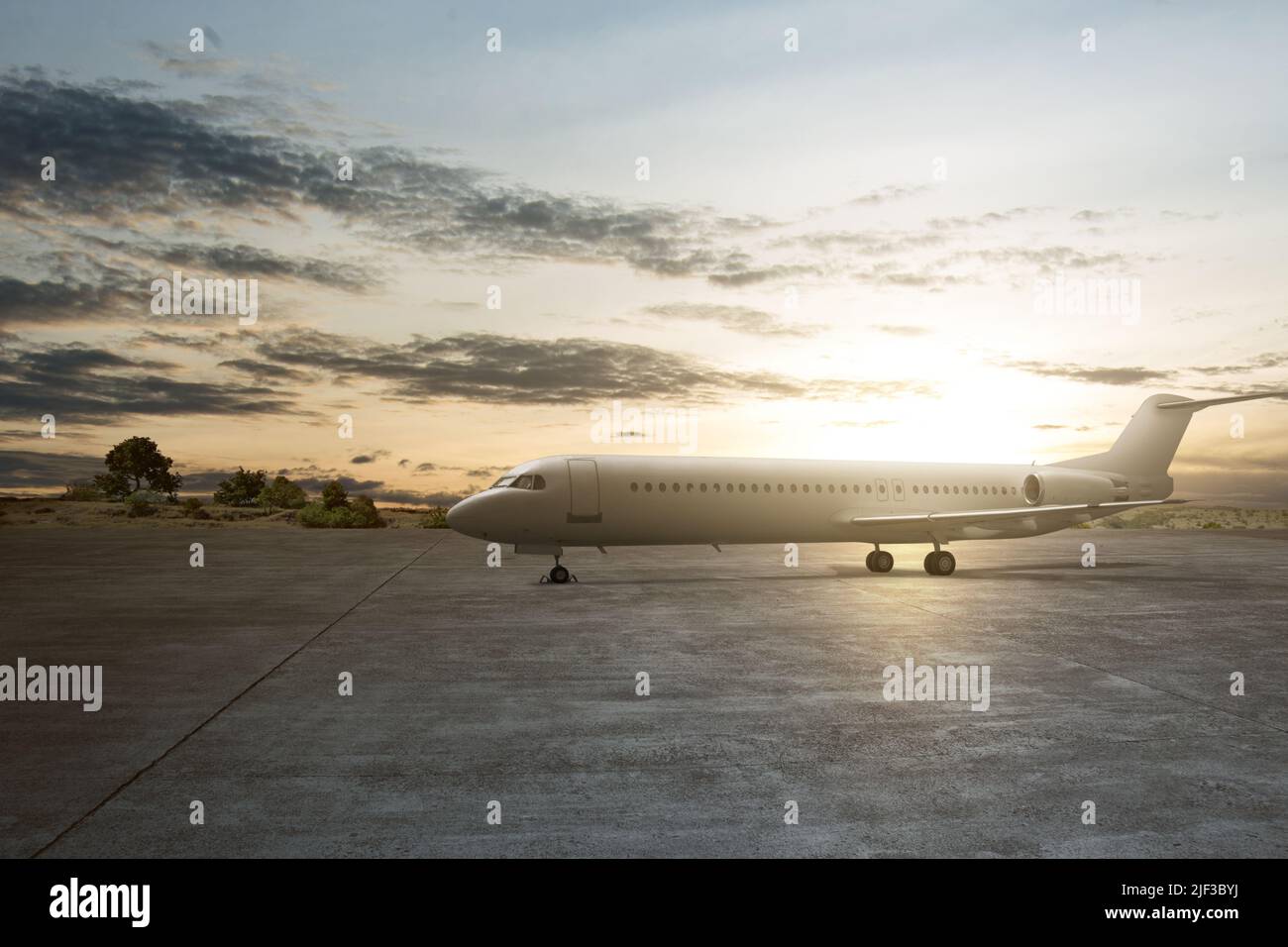 Airplane on the runway with a sunset sky background Stock Photo - Alamy
