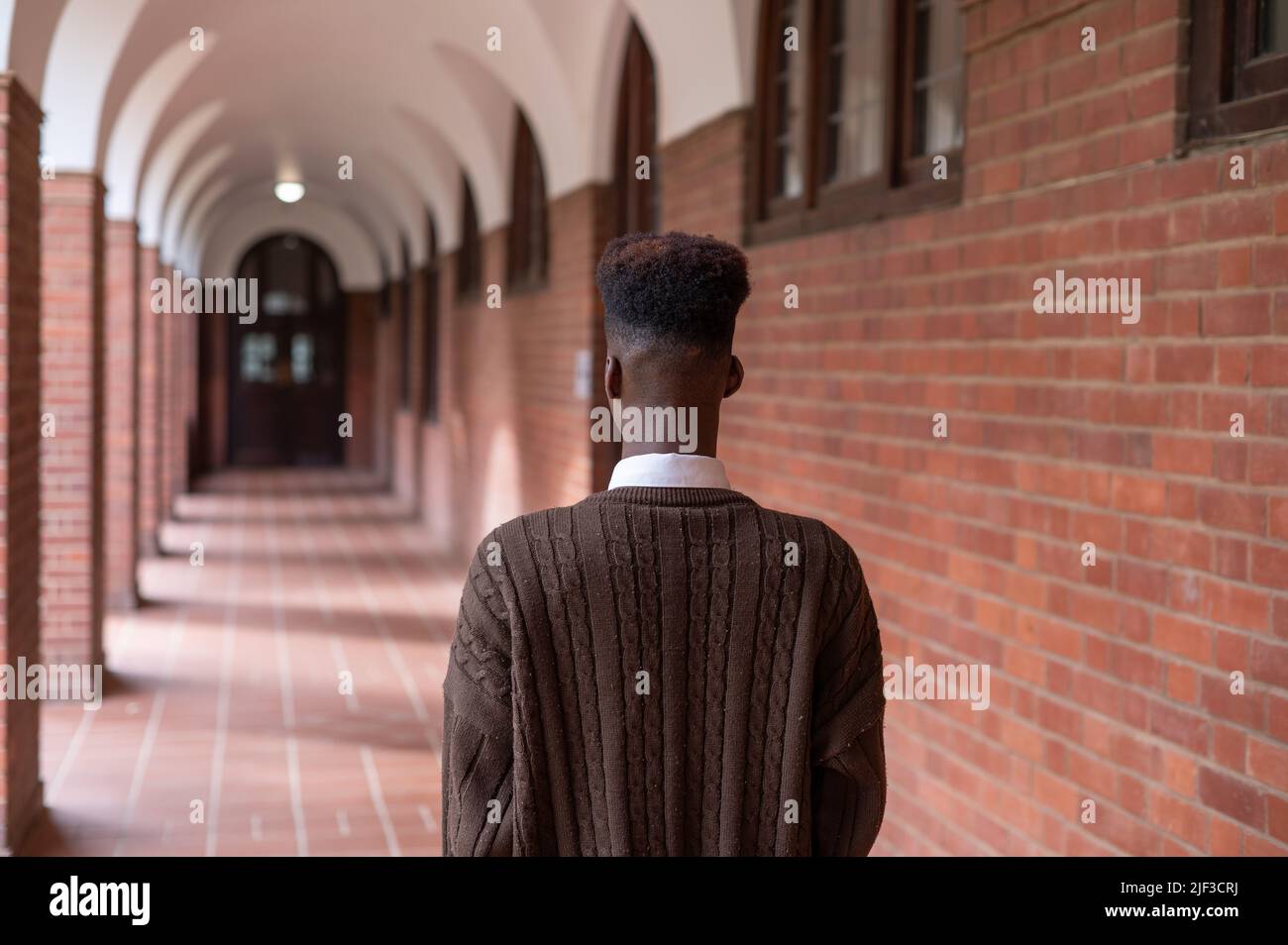 Man walking hallway hi-res stock photography and images - Alamy