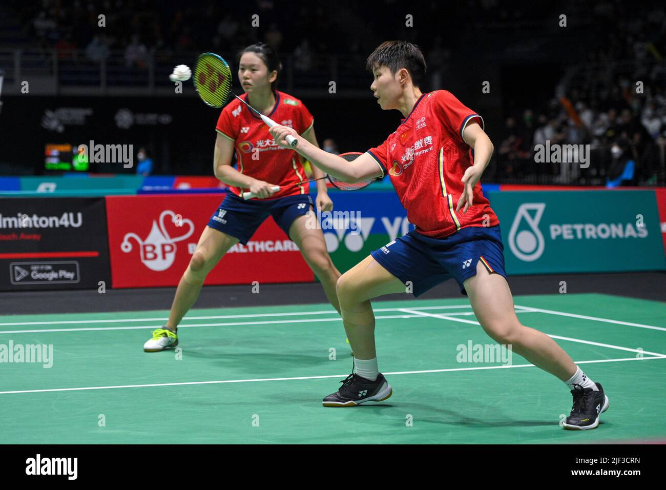 Kuala Lumpur, Malaysia. 29th June, 2022. China's Liu Xuanxuan (R)/Xia Yuting compete during the ...