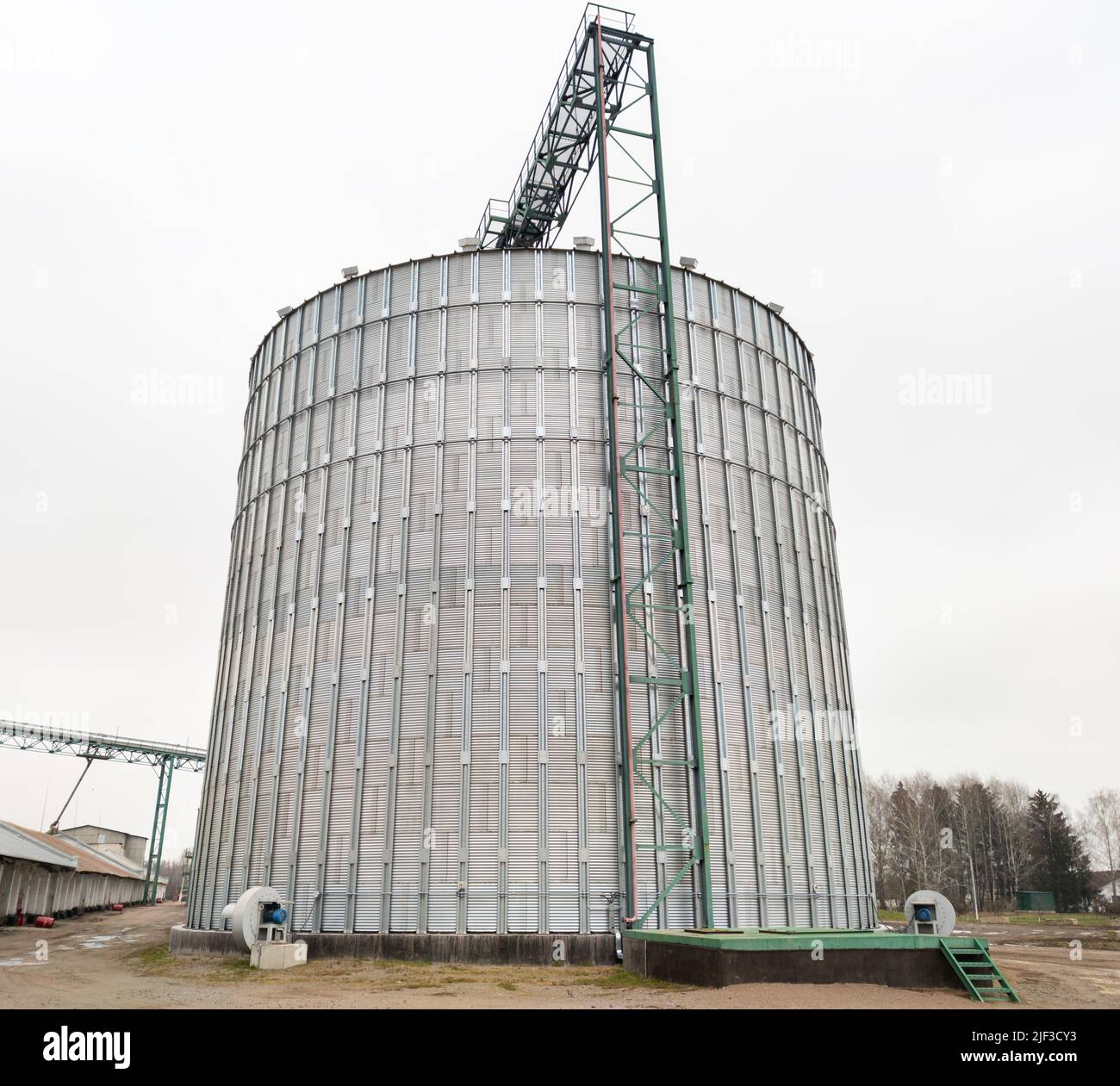 Metal silos for storing grain on the farm Stock Photo - Alamy