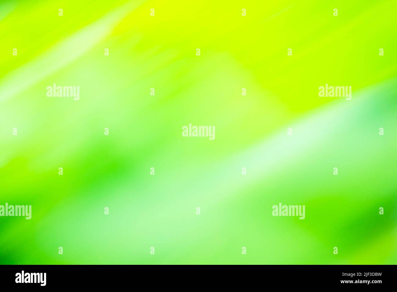 High speed motion blurred green background. Slow shutter speed with ...