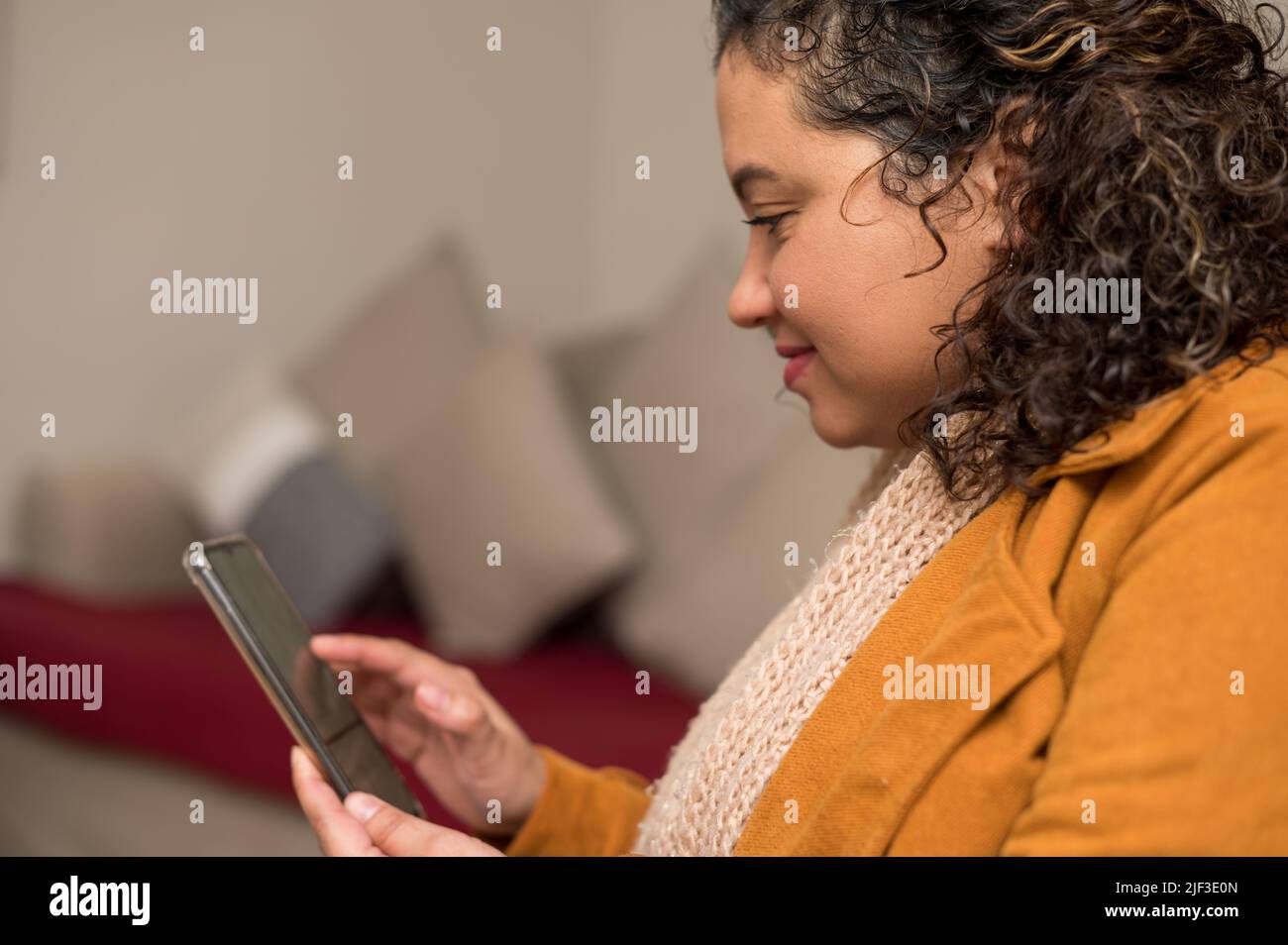 Excited woman looking smartphone hi-res stock photography and images ...