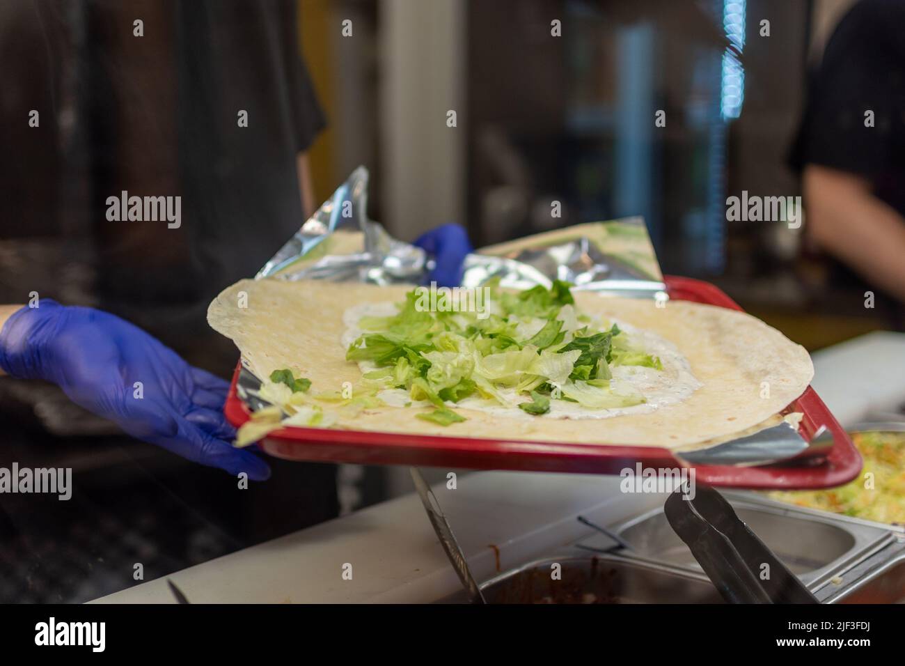 making a kebab in a restaurant Stock Photo - Alamy