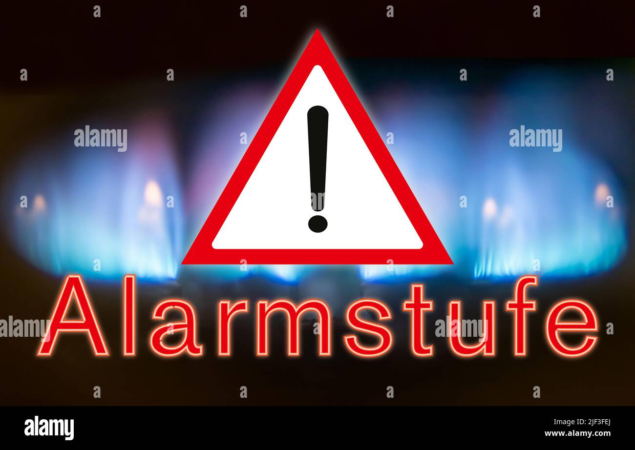 Gas Alert With Caution Sign Against Gas Flames Stock Photo - Alamy