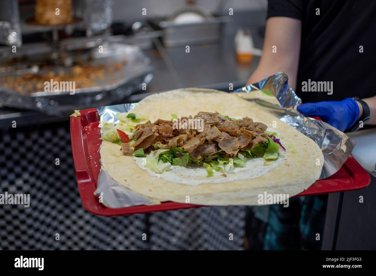 making a kebab in a restaurant Stock Photo - Alamy