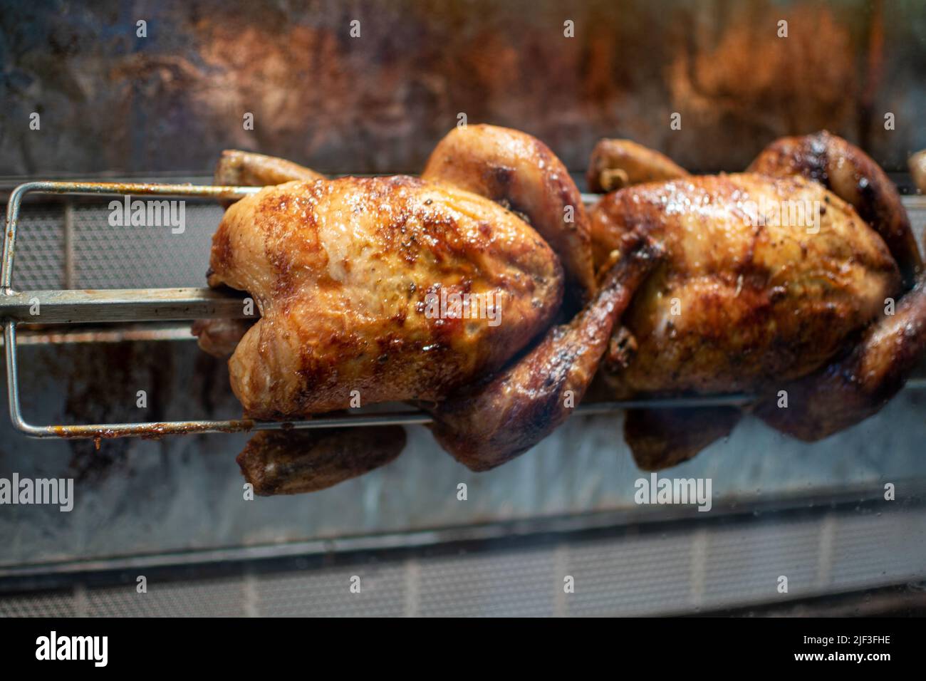Golden rotisserie chicken in restaurant hi-res stock photography and ...