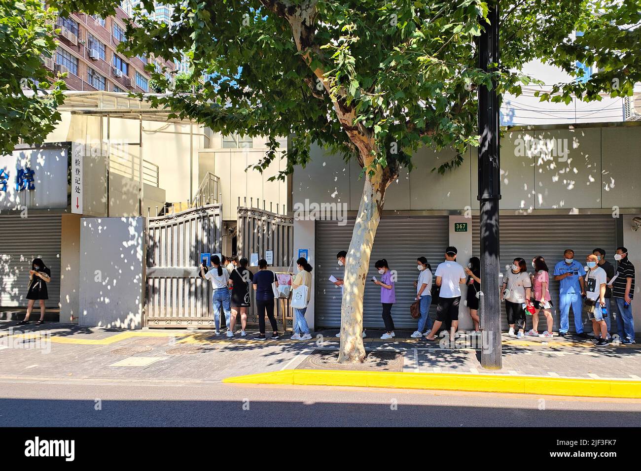 SHANGHAI, CHINA - JUNE 29, 2022 - Job seekers queue nearly 100 meters ...