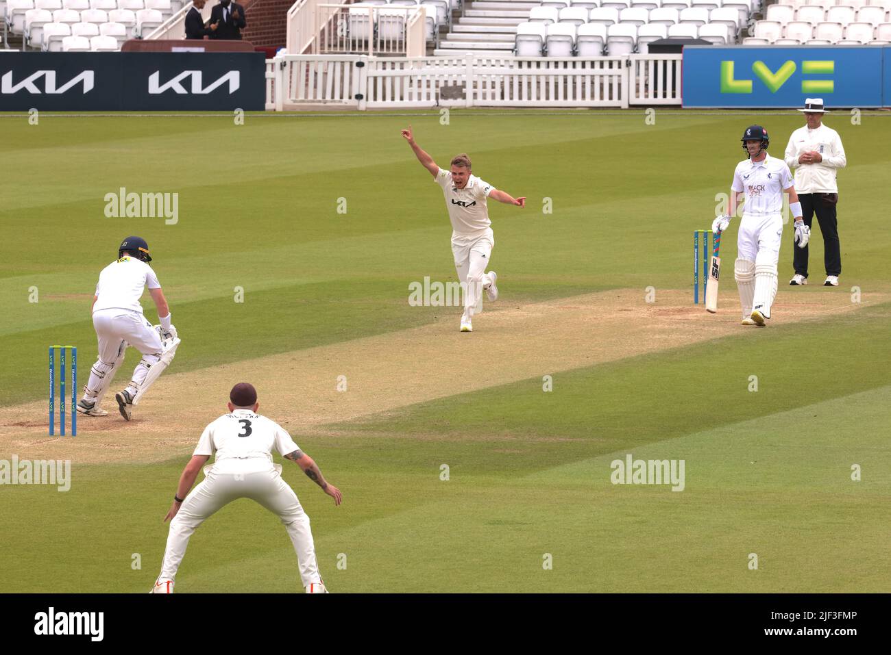 29 June, 2022. London, UK. Surrey’s Sam Curran traps Ben Compton lbw in ...