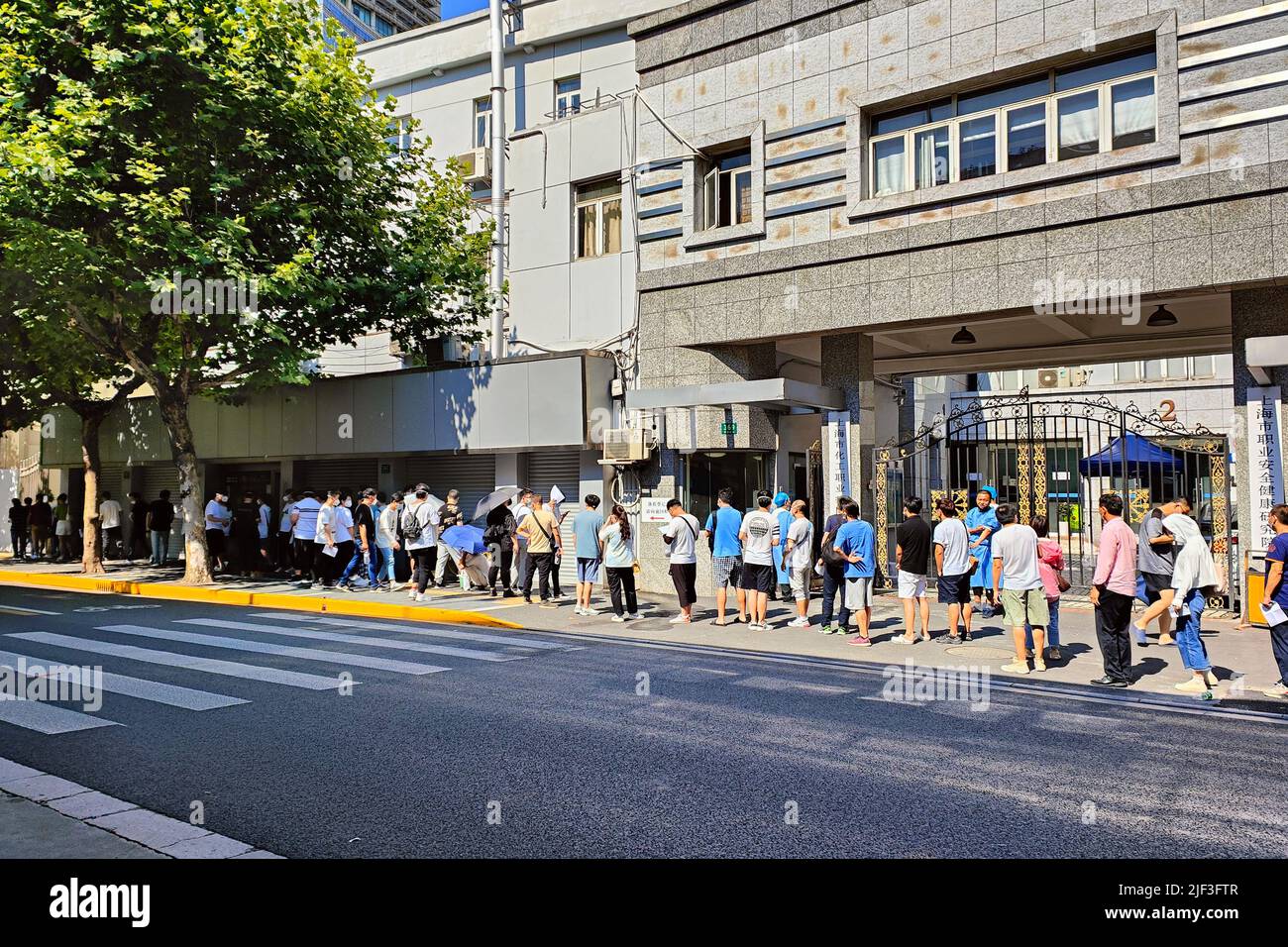 SHANGHAI, CHINA - JUNE 29, 2022 - Job seekers queue nearly 100 meters ...