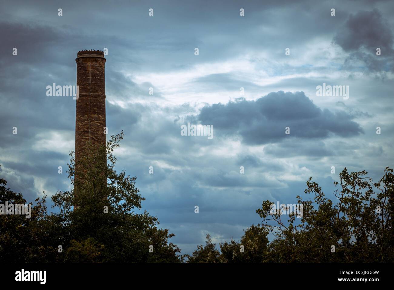 Old industrial stone chimney hi-res stock photography and images - Alamy